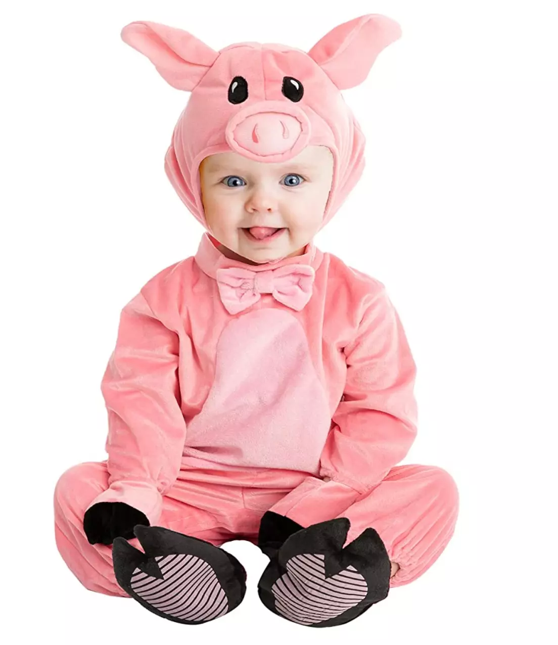 嬰兒穿著豬服裝坐起來
